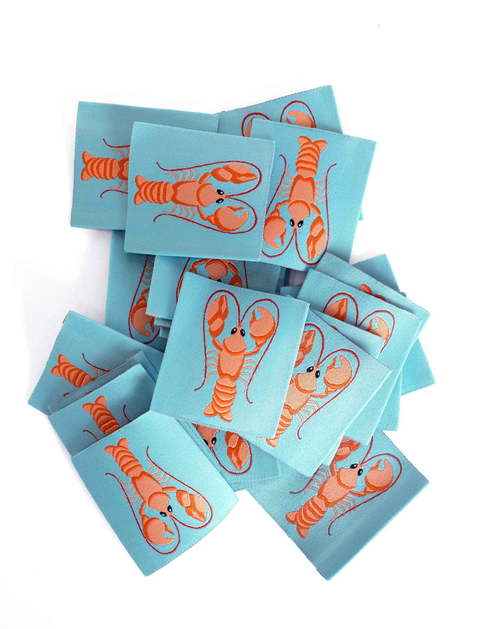 Lobster geweven kledinglabel | Oranje & turquoise | 35x40mm – Rebel Studio